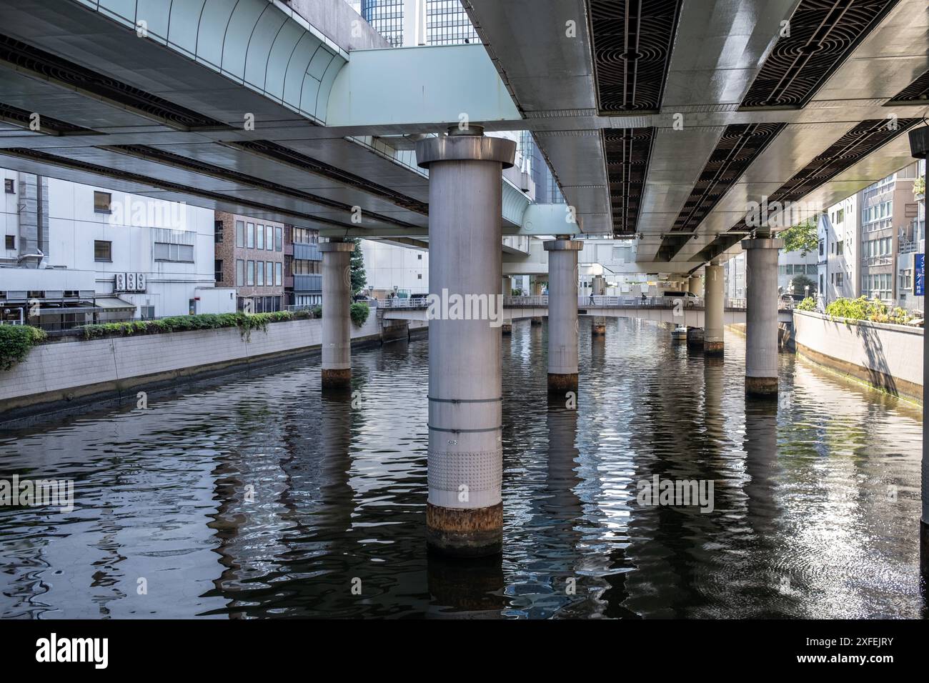 Expressway supports in River in Nihonbashi Tokyo Japan Stock Photo - Alamy