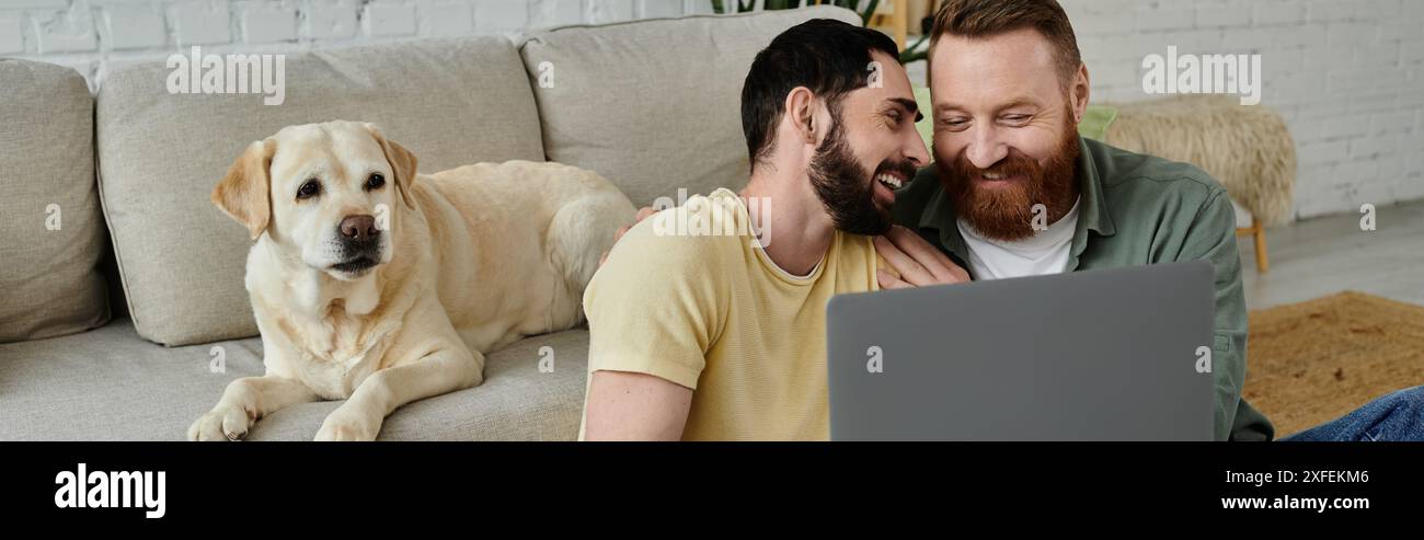 Bearded gay couple and their Labrador dog sitting on a couch, both ...