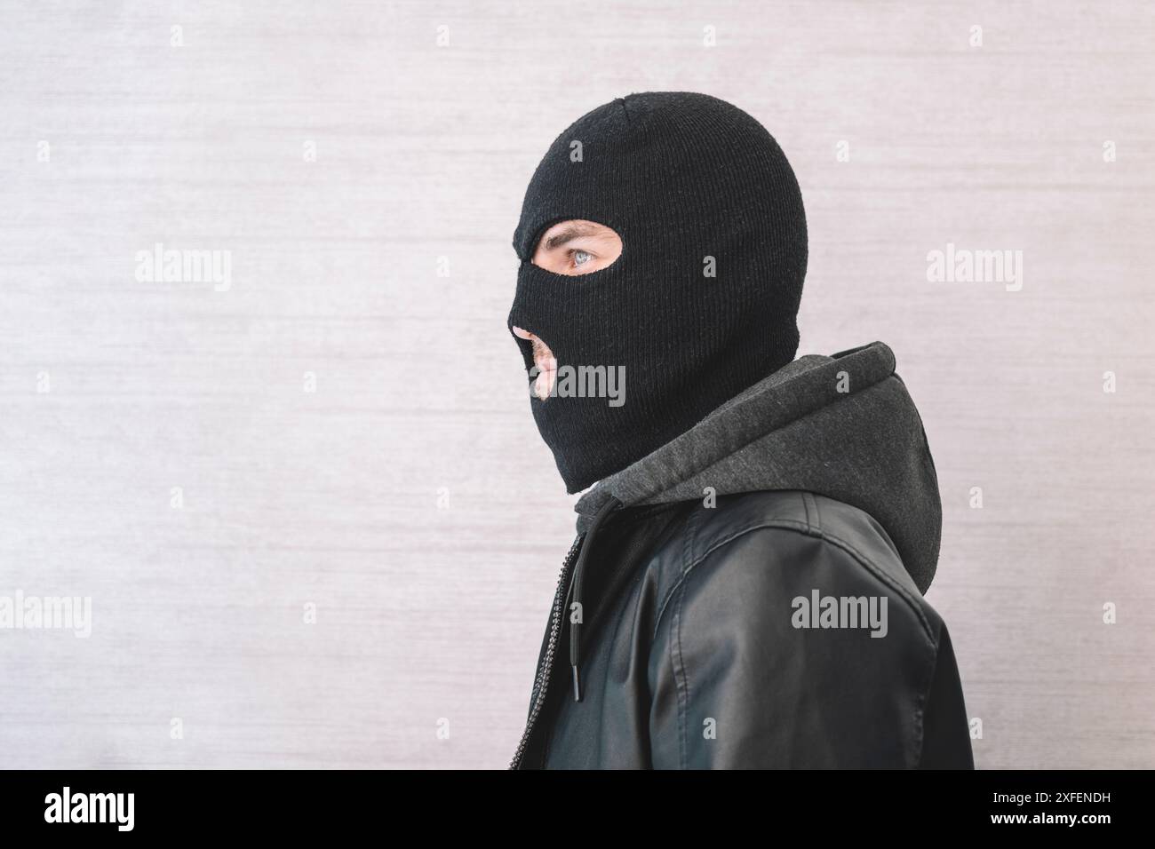 Unrecognizable terrorist wearing balaclava mask hi-res stock ...