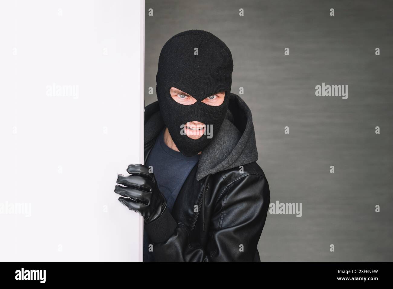 Peering around corner and danger hi-res stock photography and images ...