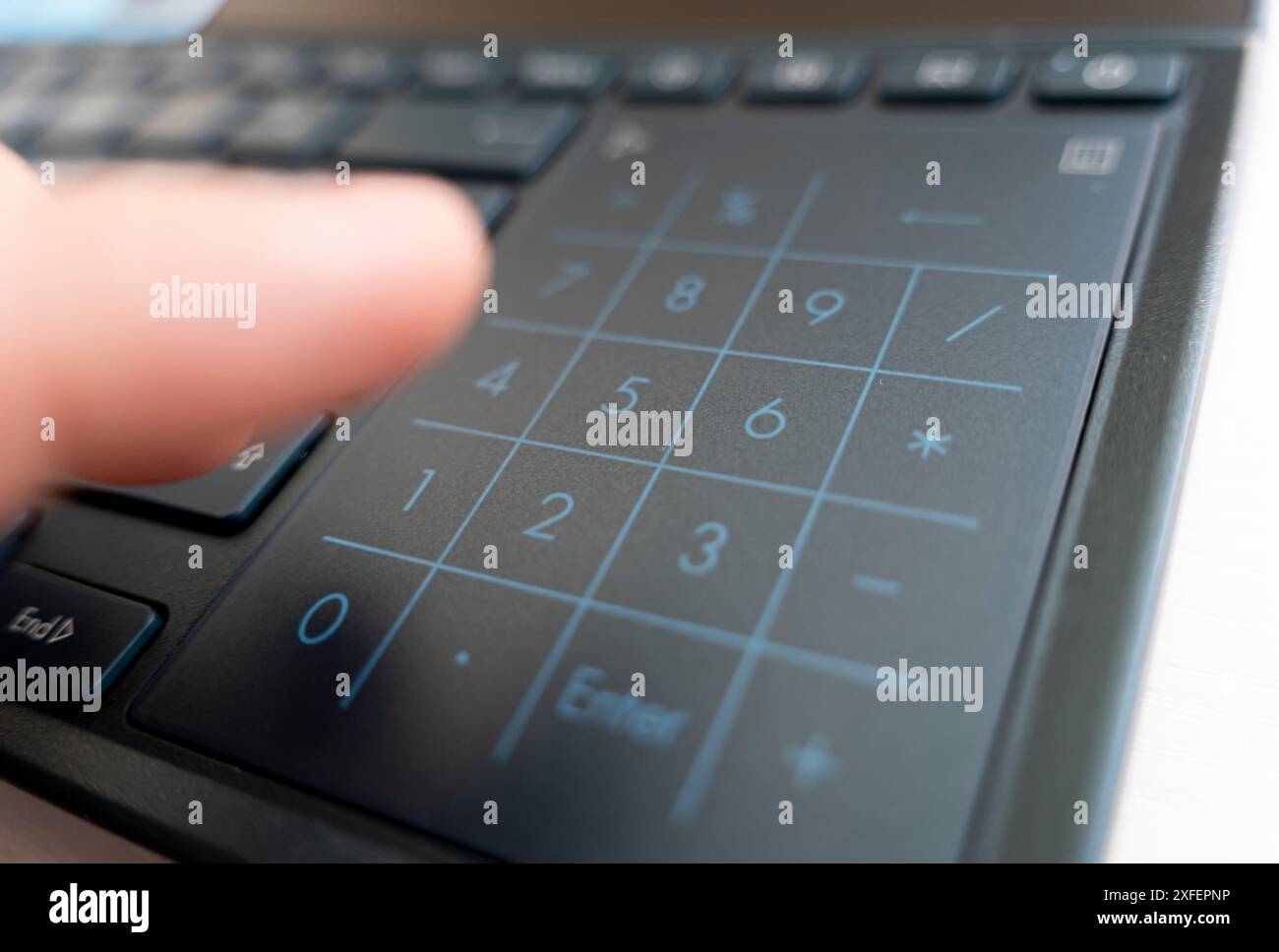 hands using a computer. fingers typing a laptop. Laptop keyboard being ...