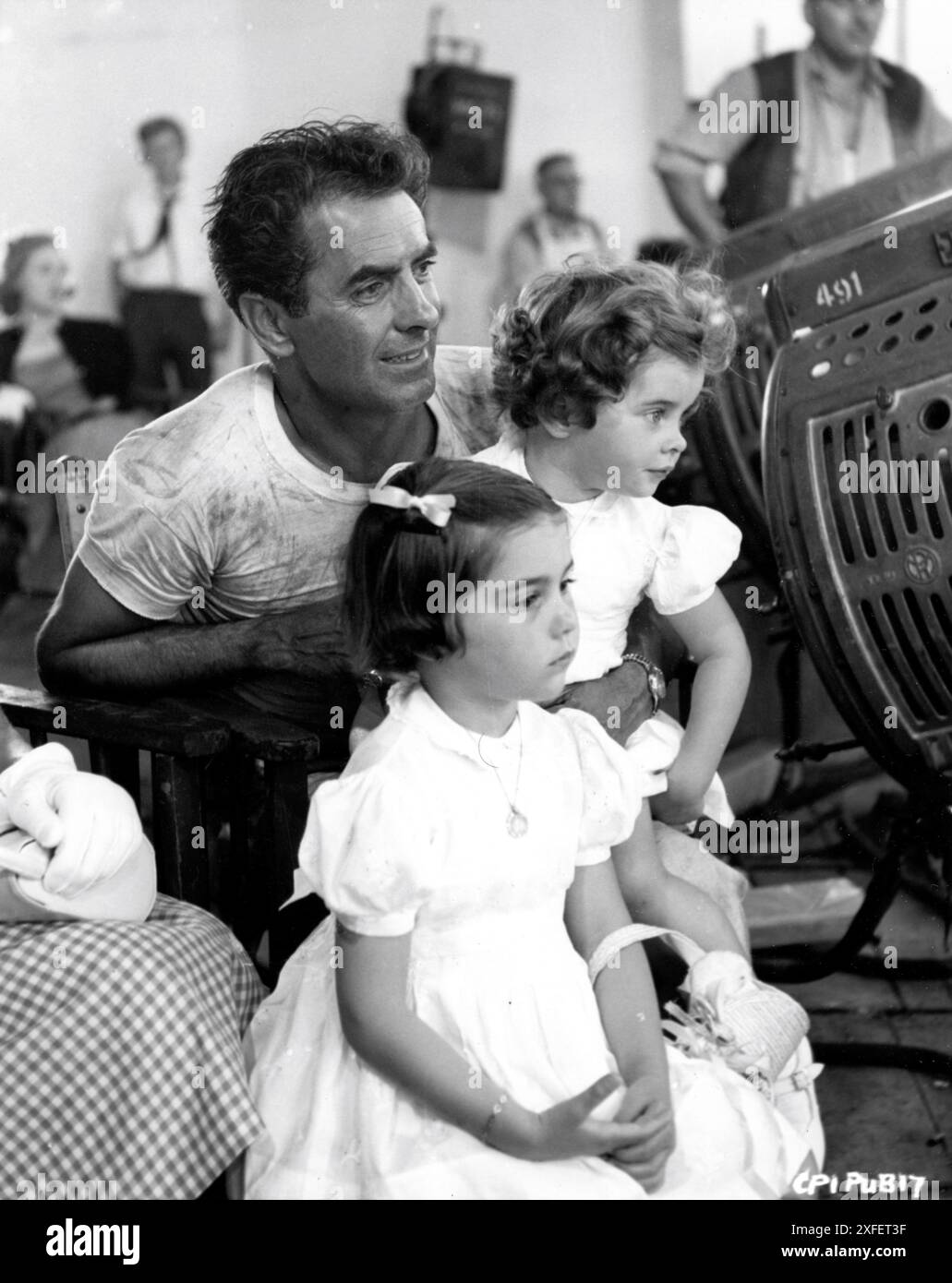 TYRONE POWER on set candid with his daughters 4 year old ROMINA and 2 year old TARYN at ...