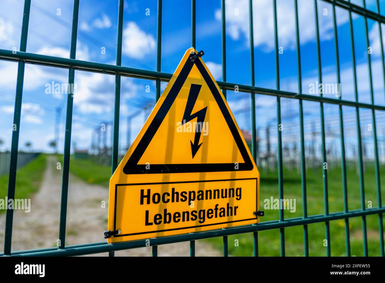Yellow warning sign with the words , Germany, Lower Saxony, Helmstedt ...