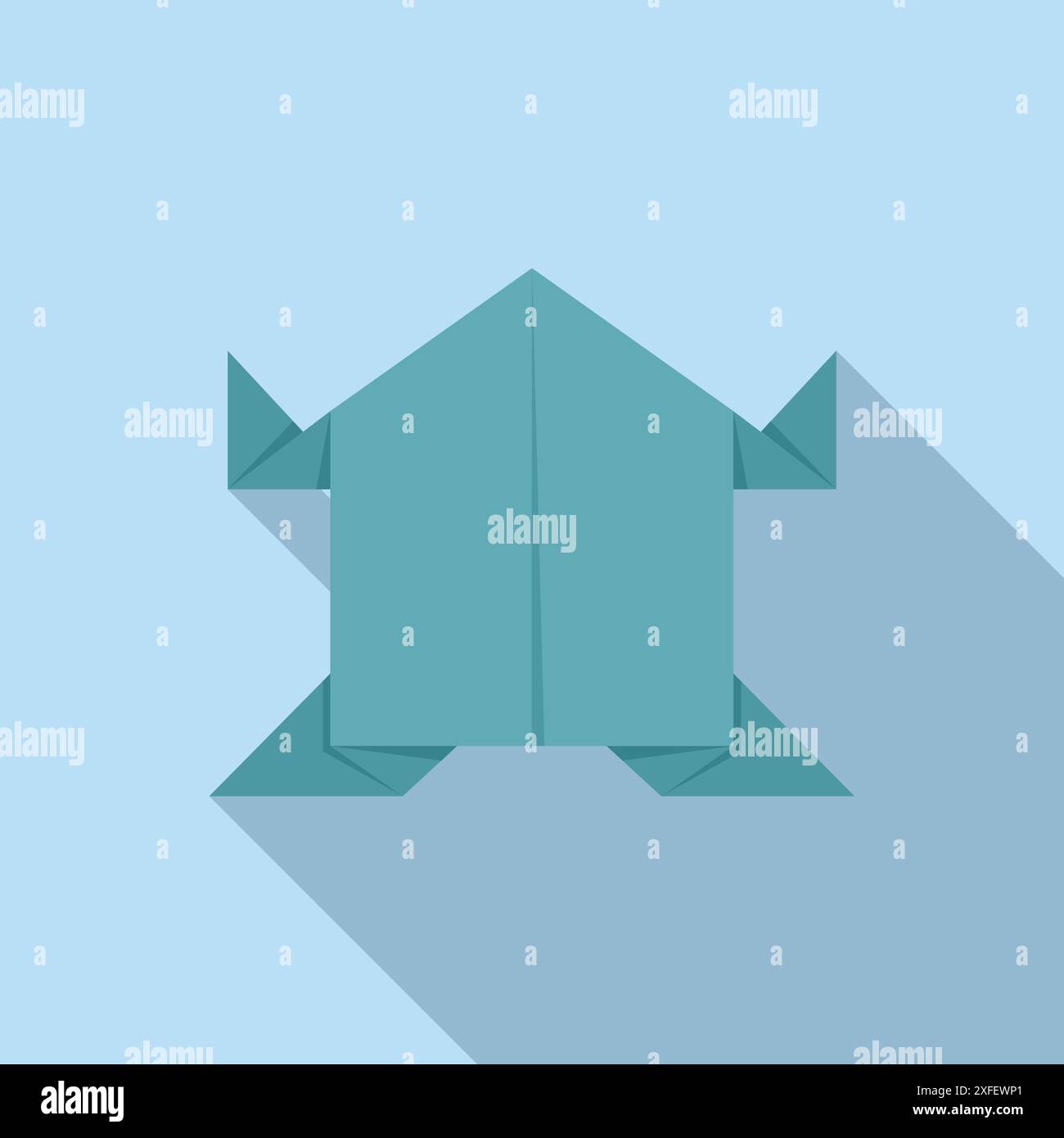 Green origami turtle standing on a blue background, casting a long ...