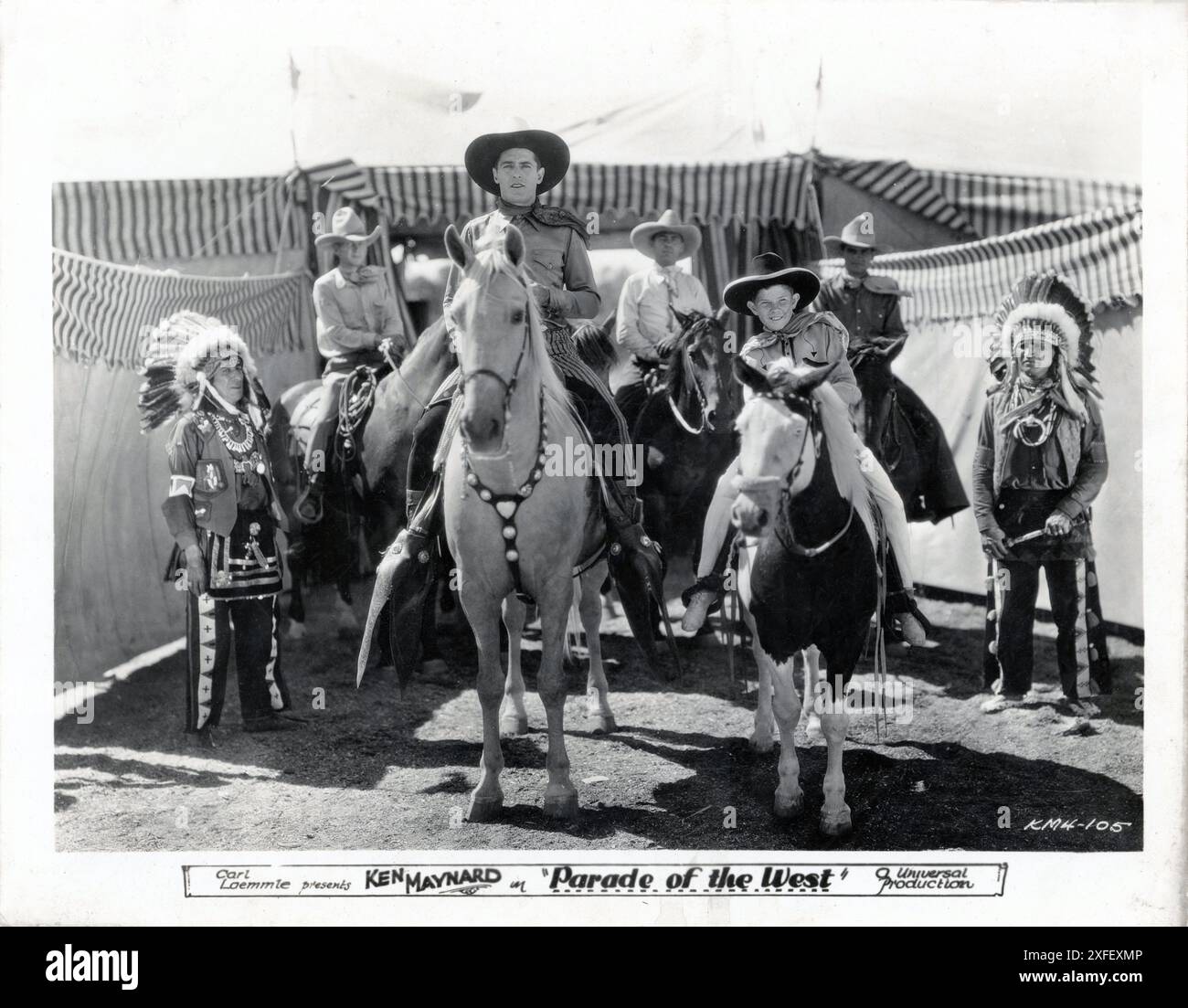 KEN MAYNARD riding his horse TARZAN and JACK / JACKIE HANLON in PARADE ...