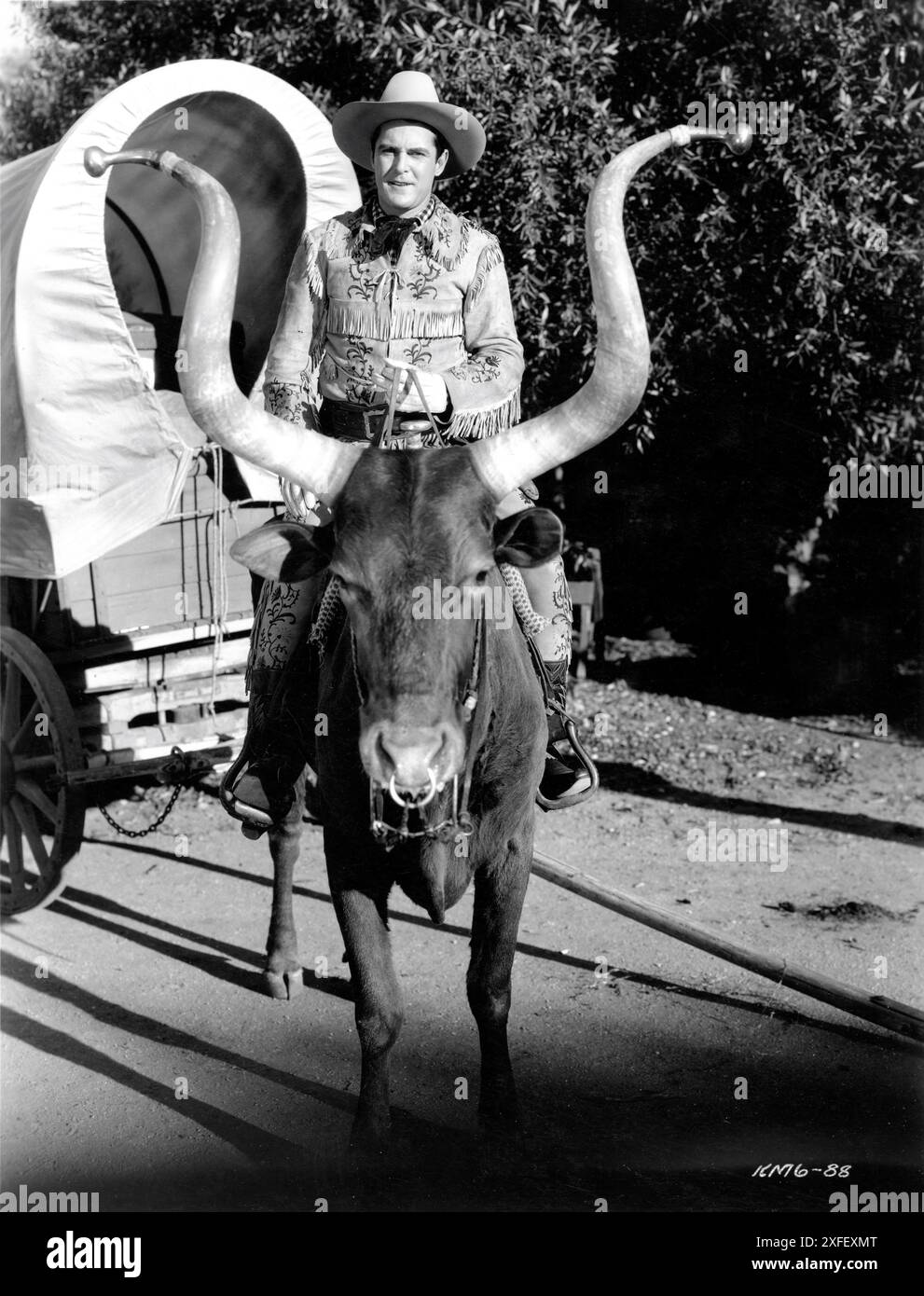 KEN MAYNARD on set candid with his co-star BOBBY aka BOBCAT TWISTER the ...