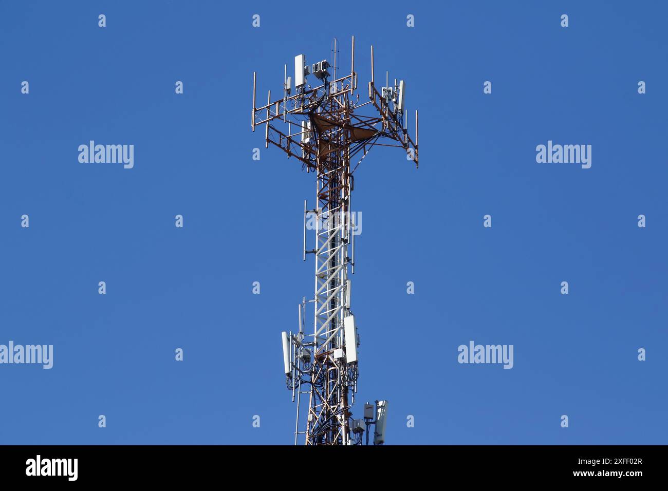 metallic tower structure with antennas and transmission, reception and ...