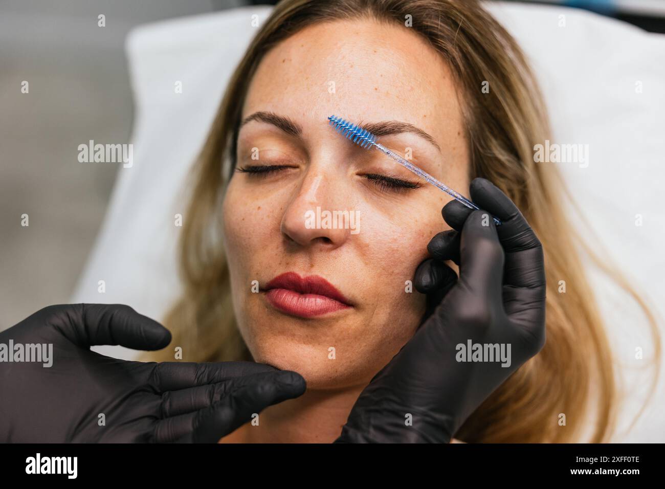 Professional microblading procedure in progress Stock Photo - Alamy