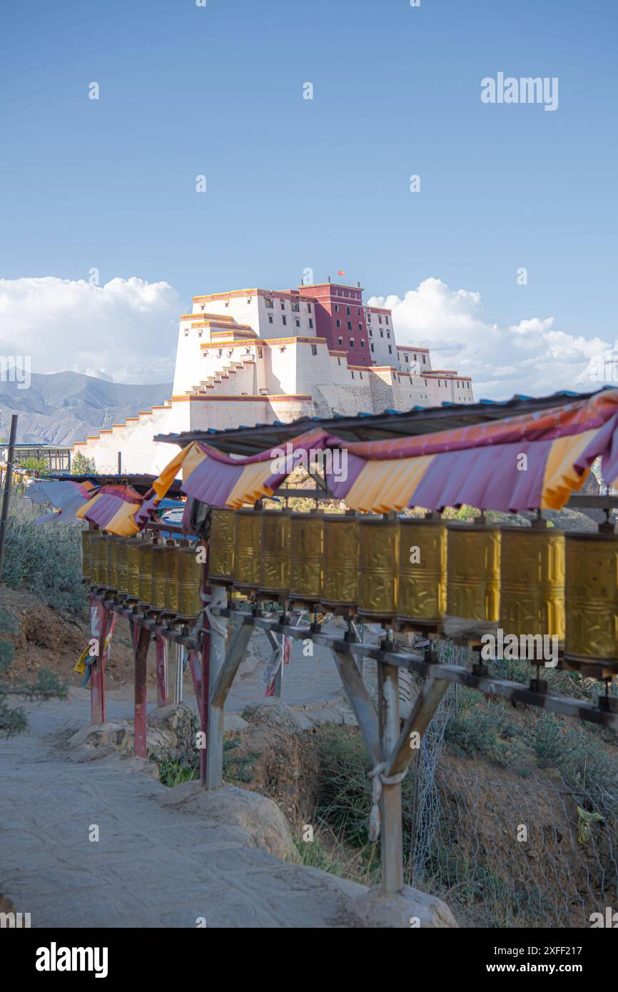 Tibetan prayer wheels or prayer's rolls of the faithful Buddhists and ...