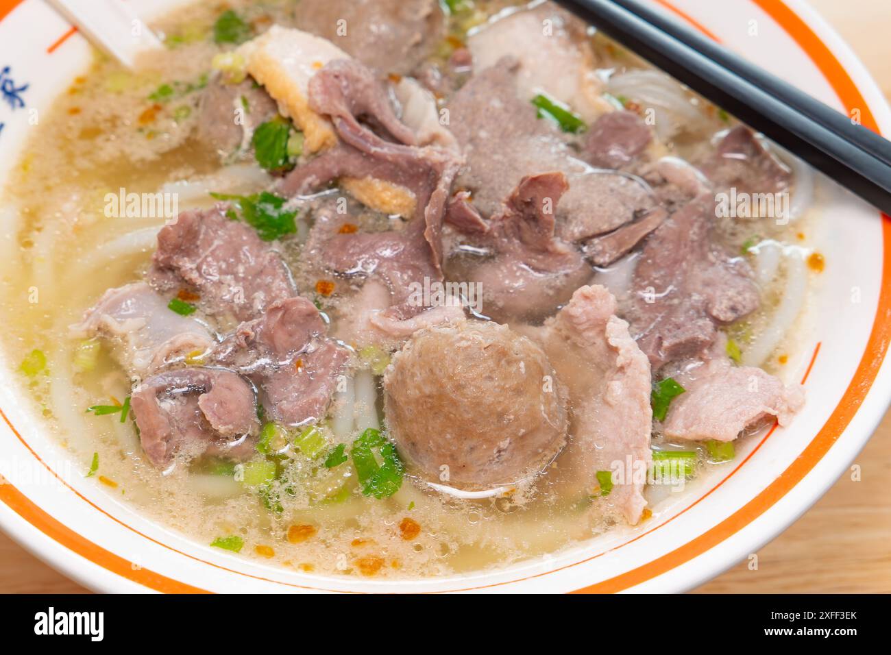 angle view beef balls and pork offal with Guilin rice noodles at ...