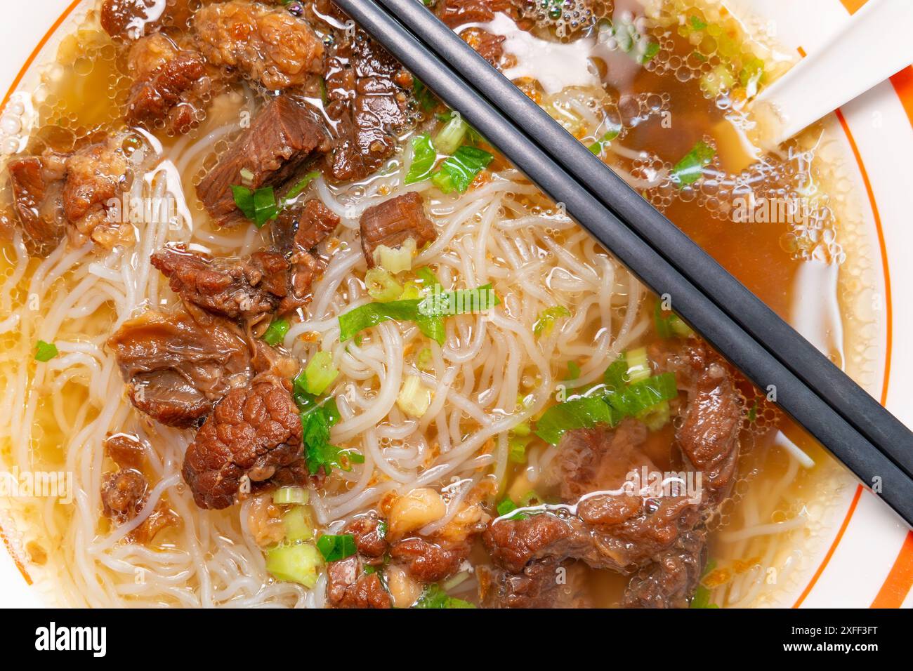 top view rice noodles with braised beef brisket at horizontal ...