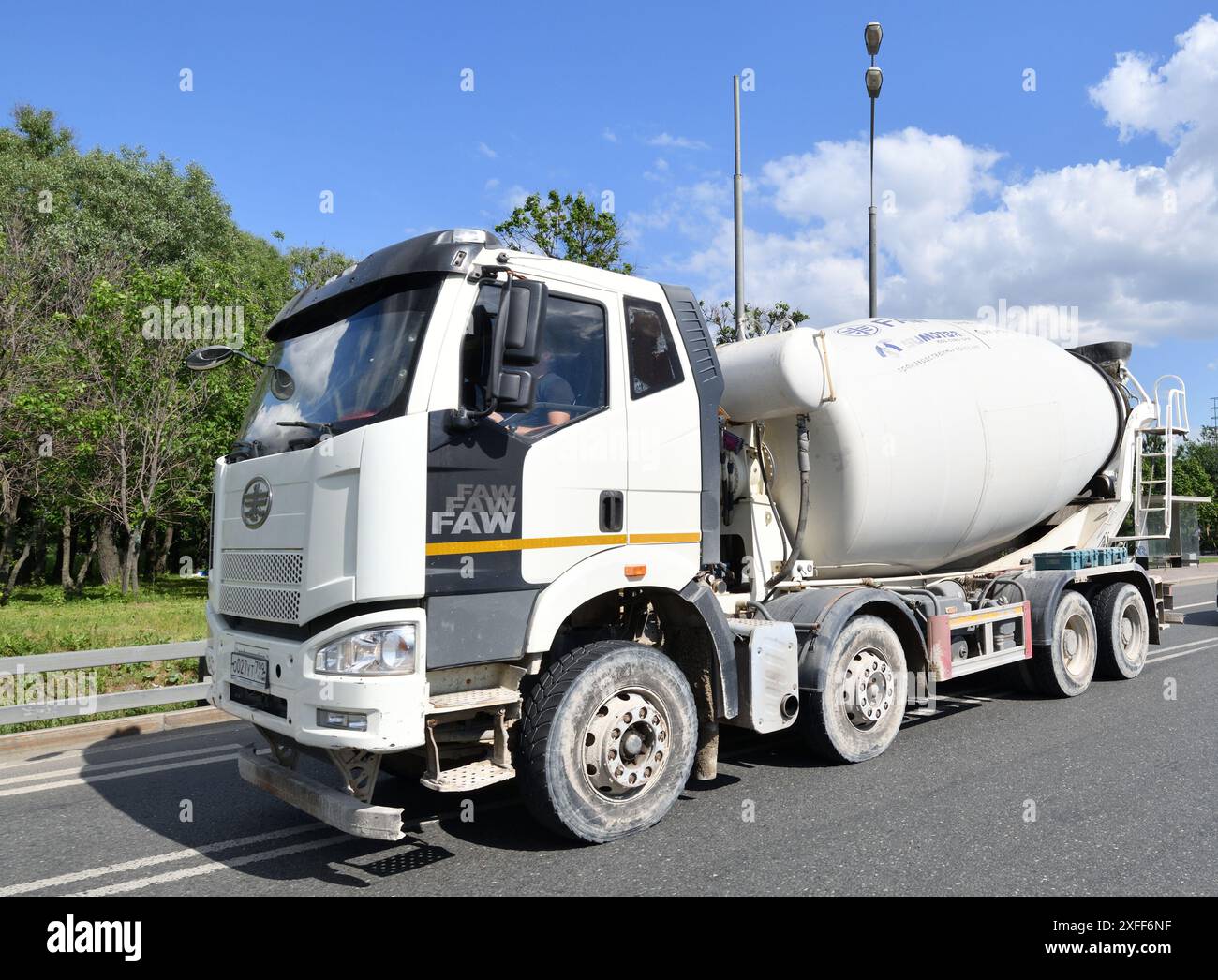 Moscow, Russia - 8 June. 2024. white Chinese FAW concrete mixer truck ...