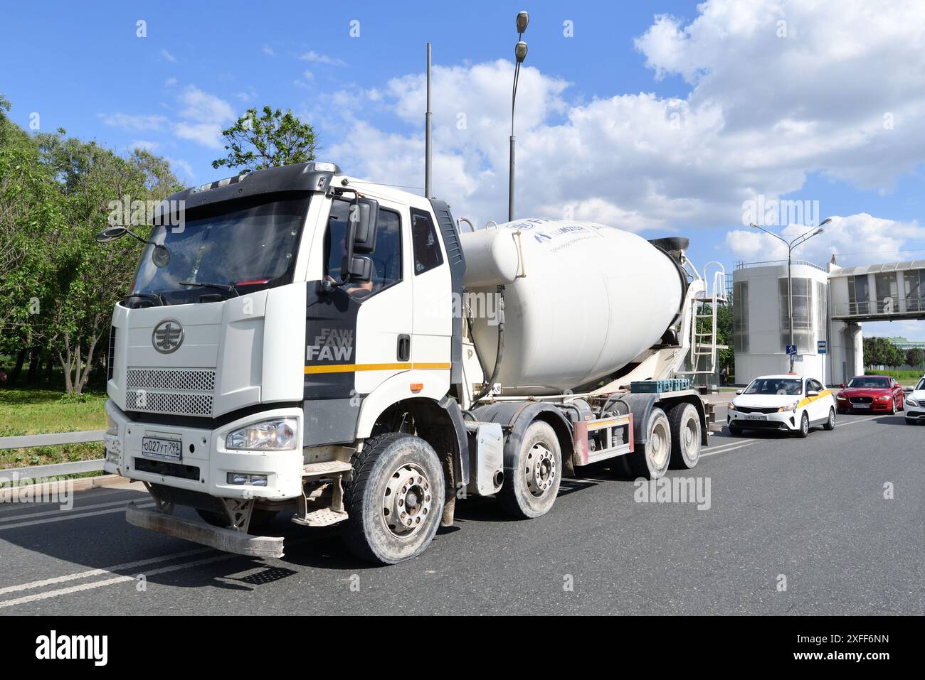 Moscow, Russia - 8 June. 2024. white Chinese FAW concrete mixer truck ...