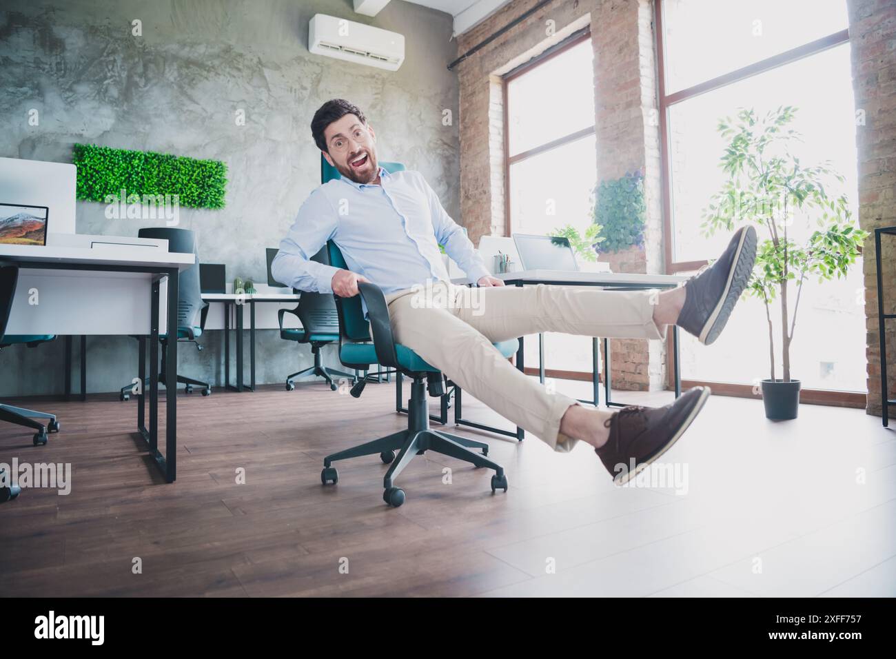 Full size photo of successful elegant man ride chair wear shirt loft ...