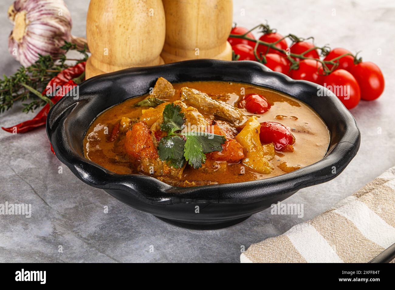 Yellow Thai curry soup with beef Stock Photo - Alamy