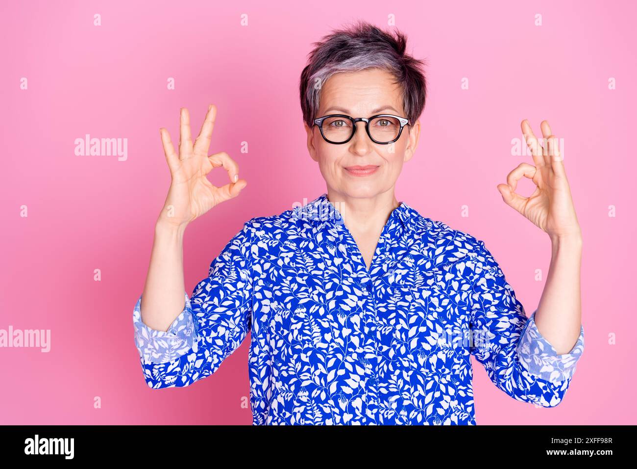 Photo of satisfied retired person with gray hair dressed blouse in ...