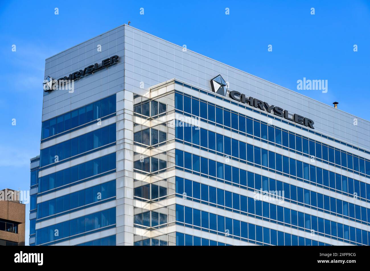 Chrysler logo sign on top of a building, Windsor, Canada Stock Photo ...