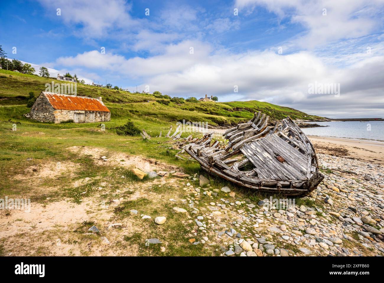 The beach at Talmine on Tongue Bay with an old Fishing hut in the ...