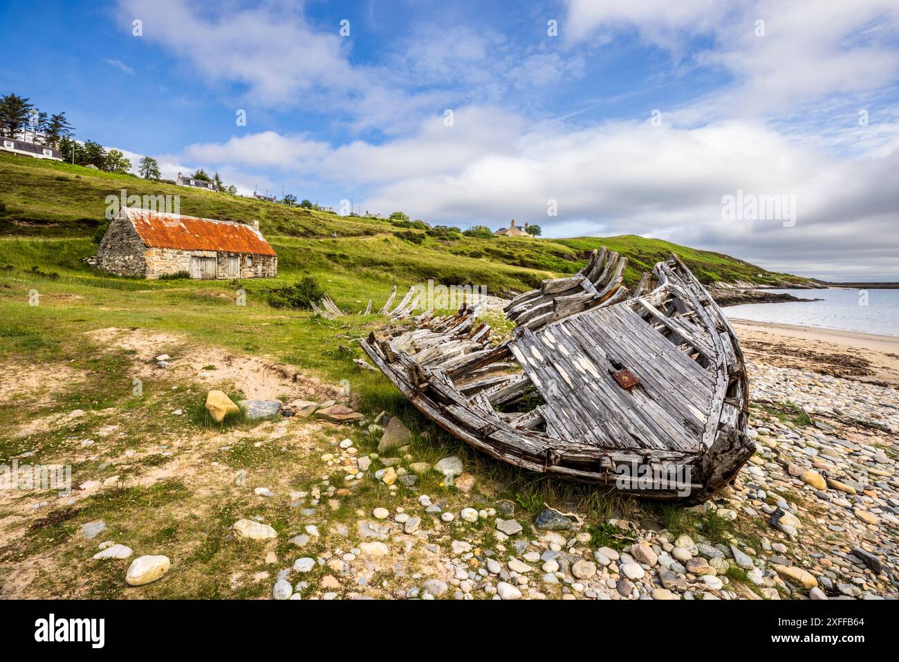 The beach at Talmine on Tongue Bay with an old Fishing hut in the ...