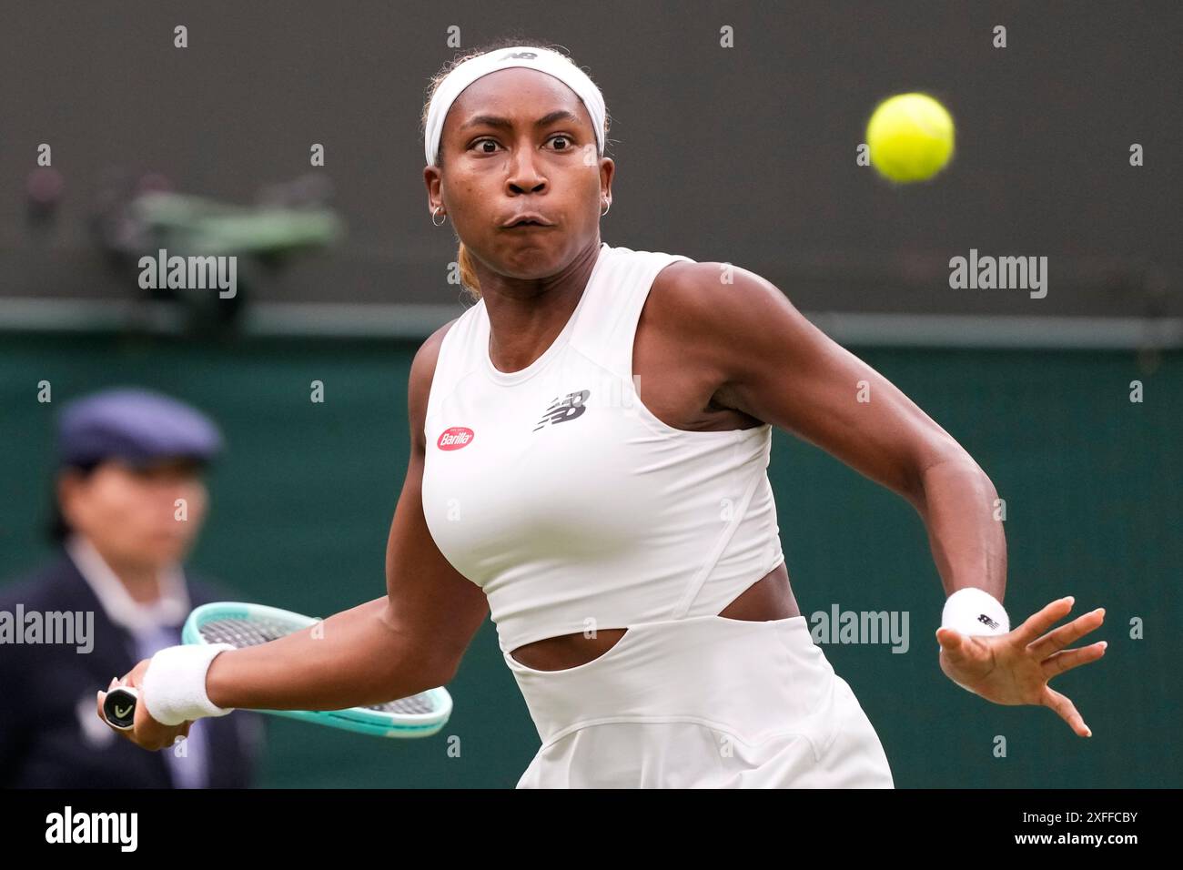 Coco Gauff of the United States plays a forehand return to Anca Todoni ...