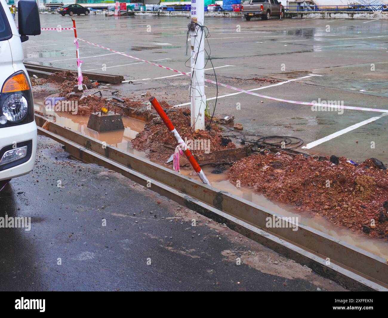 Close-up of road being excavated for renovation, repair of main city ...