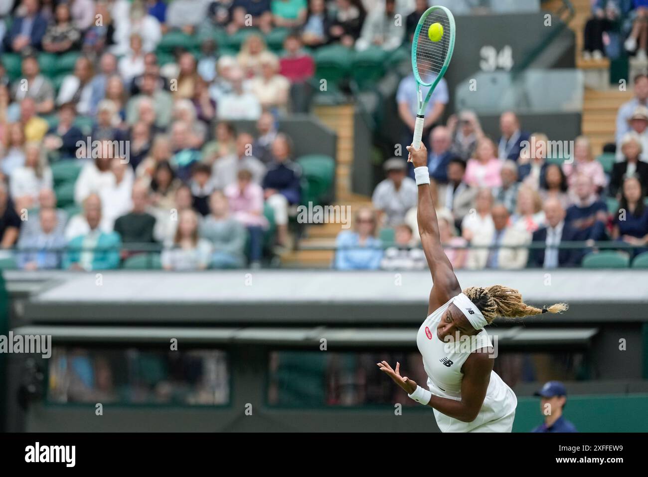 Coco Gauff of the United States serves to Anca Todoni of Romania during ...
