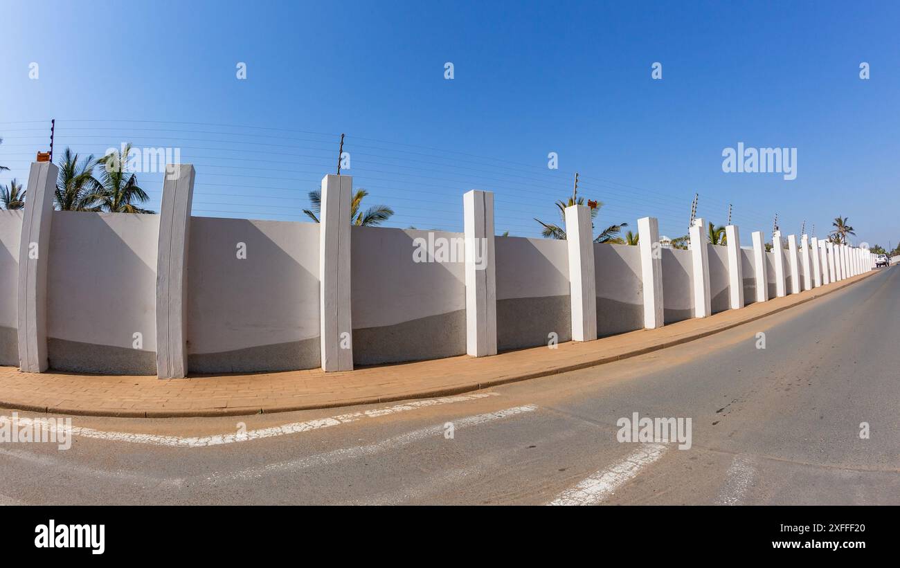 Boundary wall made of brick block materials with electrical shock wires ...