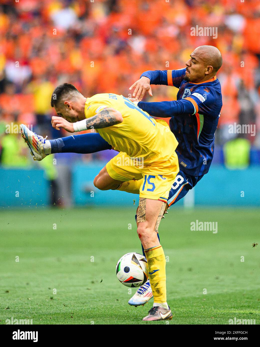 MUNICH, GERMANY - 2 JULY, 2024: Andrei Burca, Donyell Malen, The ...