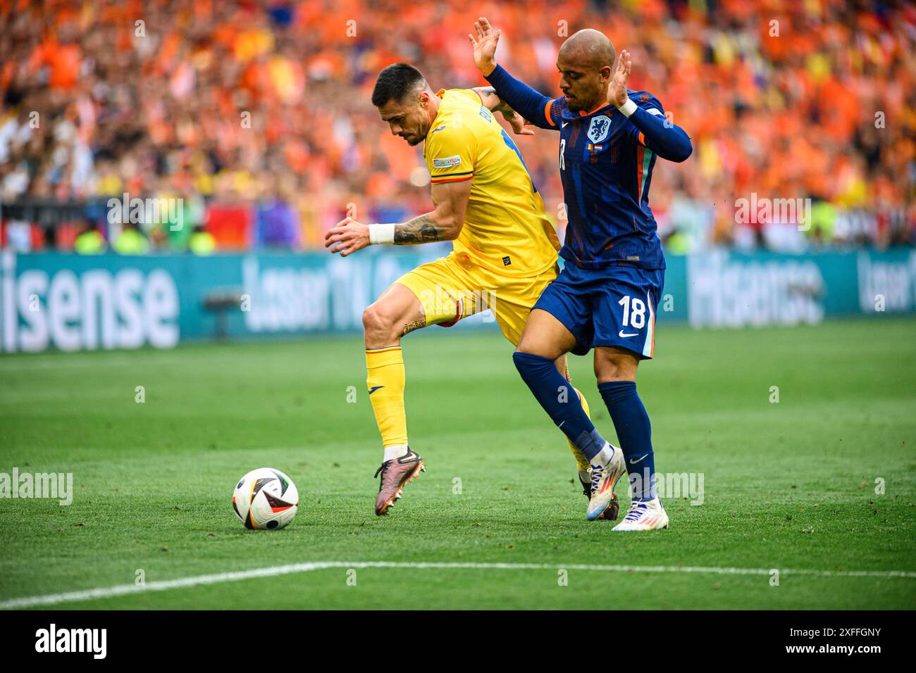 MUNICH, GERMANY - 2 JULY, 2024: Andrei Burca, Donyell Malen, The ...