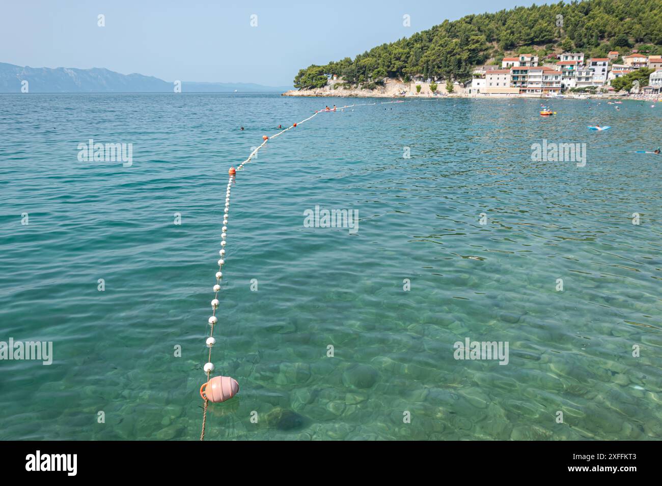 Floating the mark on the sea Stock Photo - Alamy