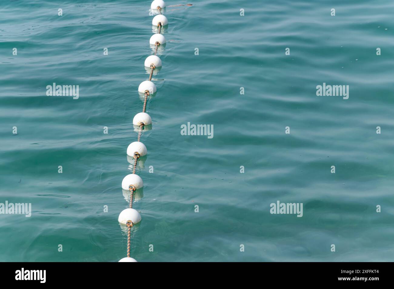 Floating the mark on the sea Stock Photo - Alamy