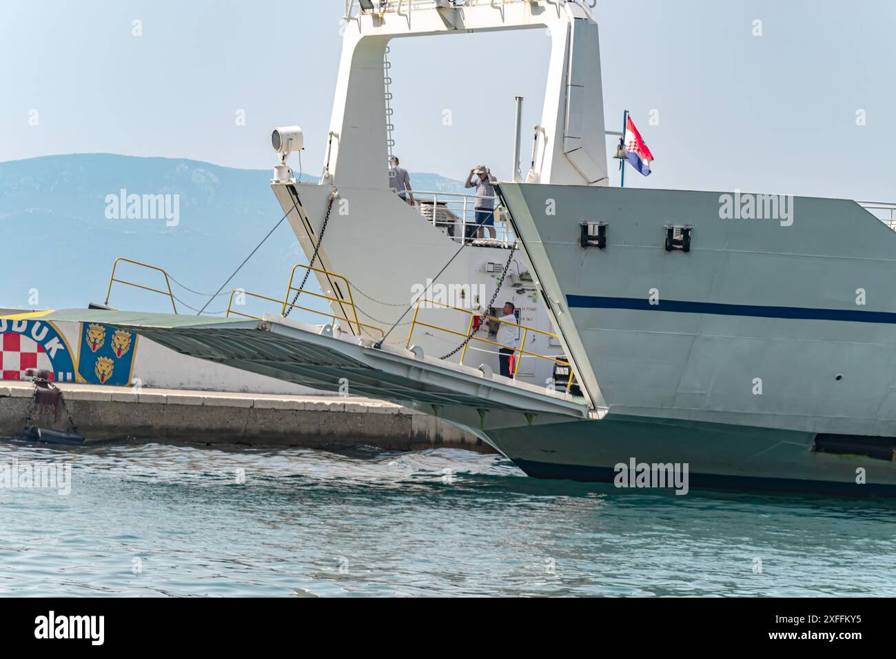 The ferry ship in harbor Stock Photo - Alamy