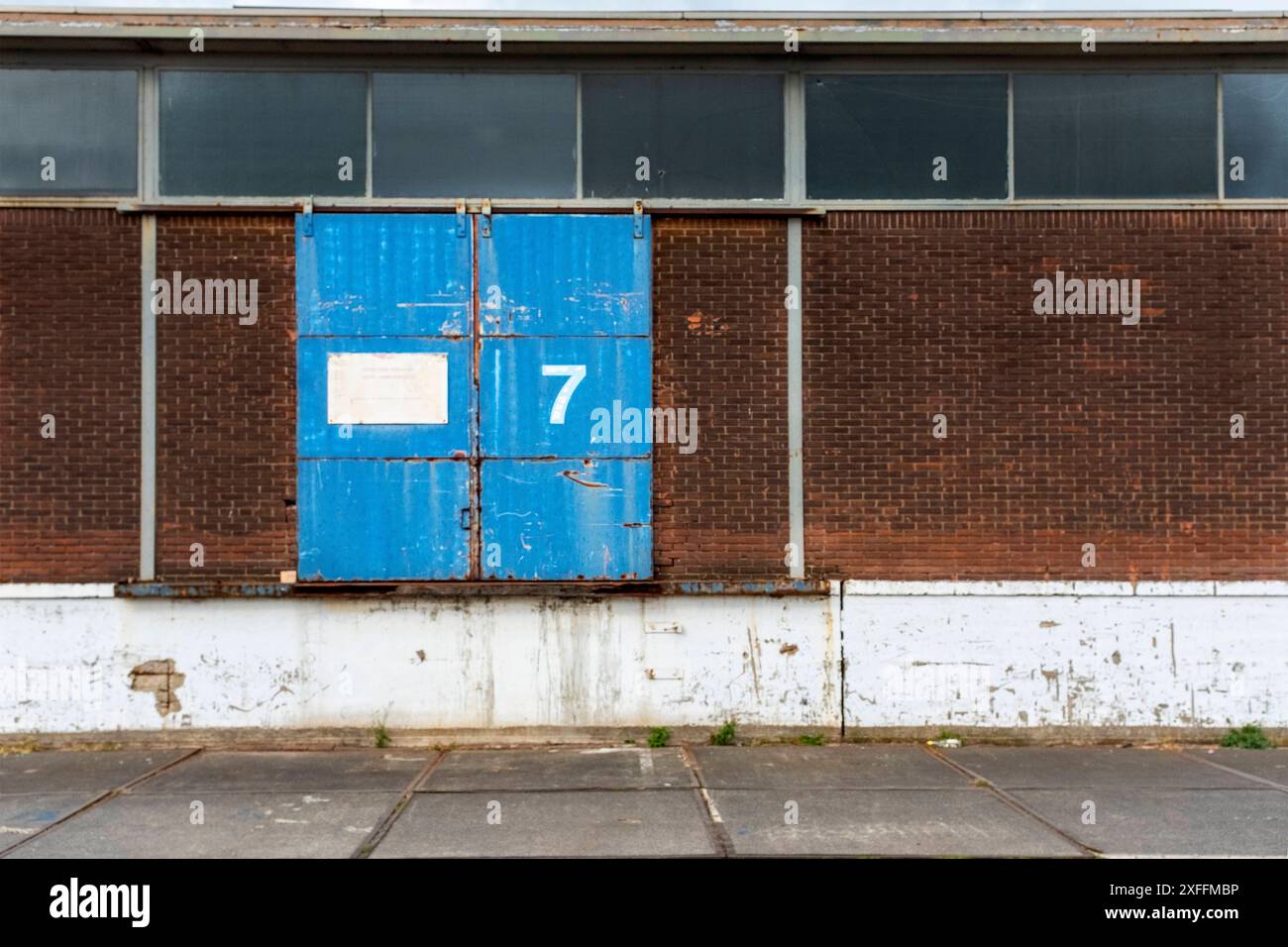Blue, Industerial Warehouse Door A blue door inside an industrial, 1950 ...