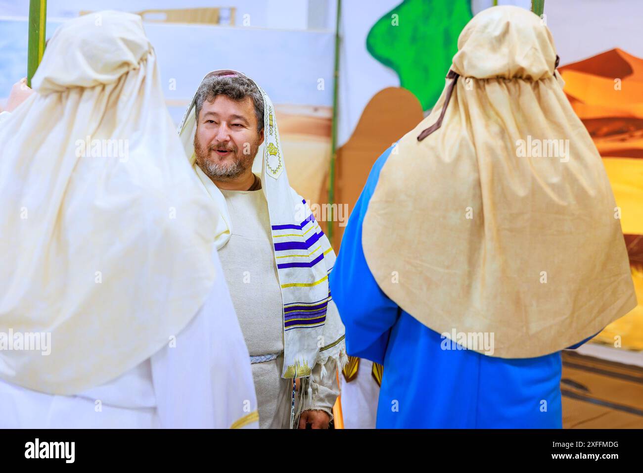 During prayer, Rabbi is dressed in traditional Jewish clothing at ...