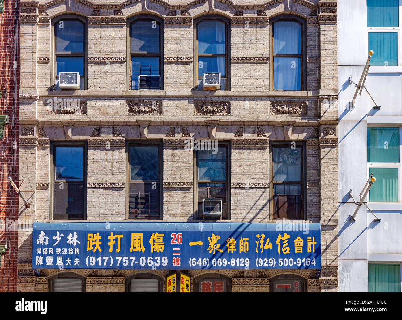 NYC Chinatown: 26 East Broadway is a six-story beige roman brick and ...