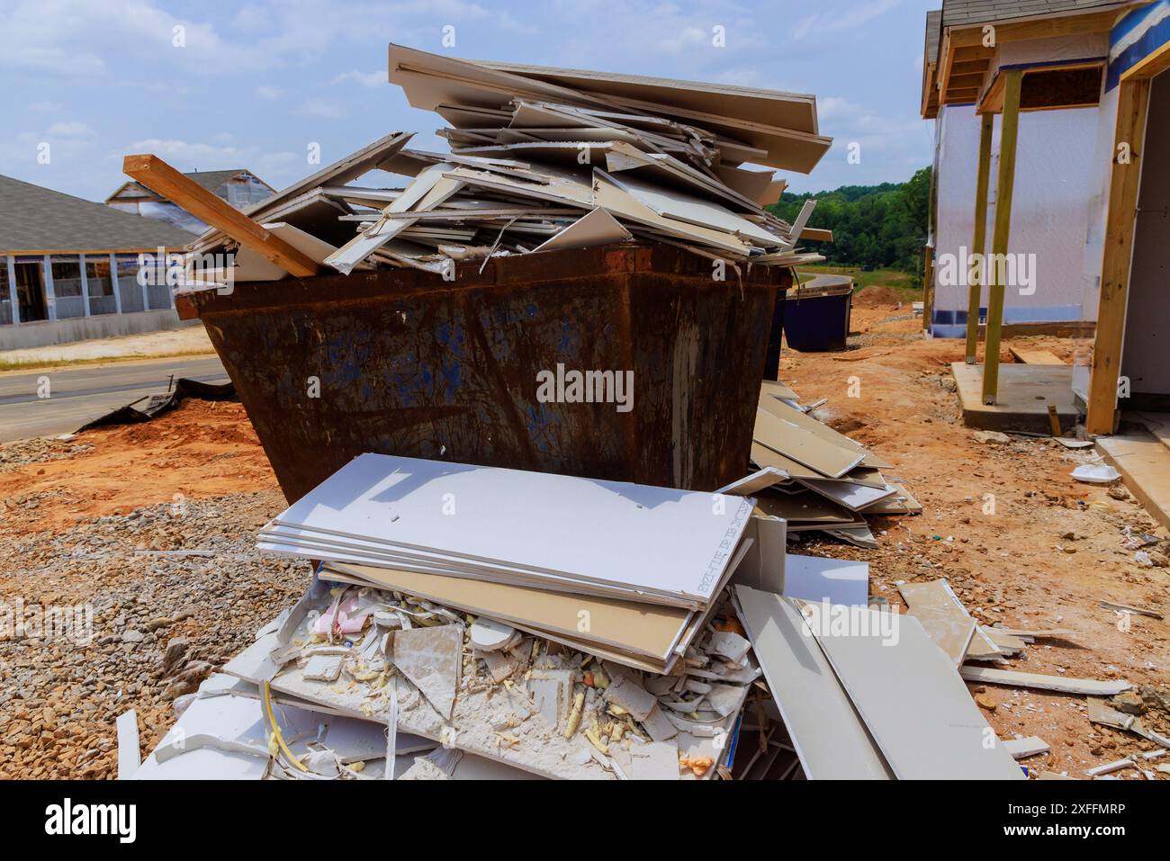 Remains of plasterboard drywall were placed in construction waste ...