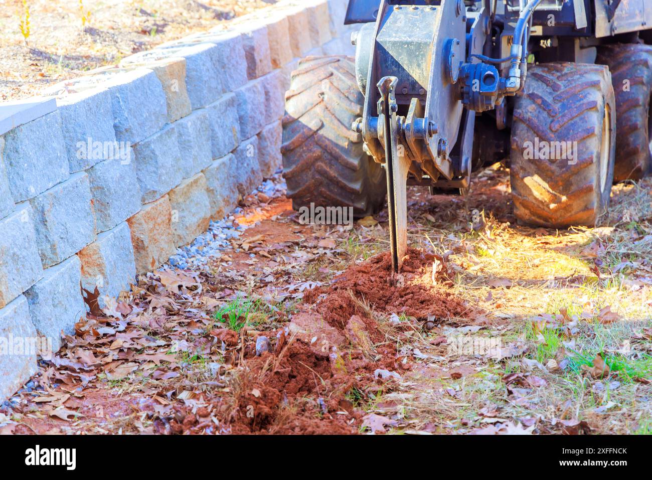 Trencher cable plow tractor is used for installation of fiber optic ...