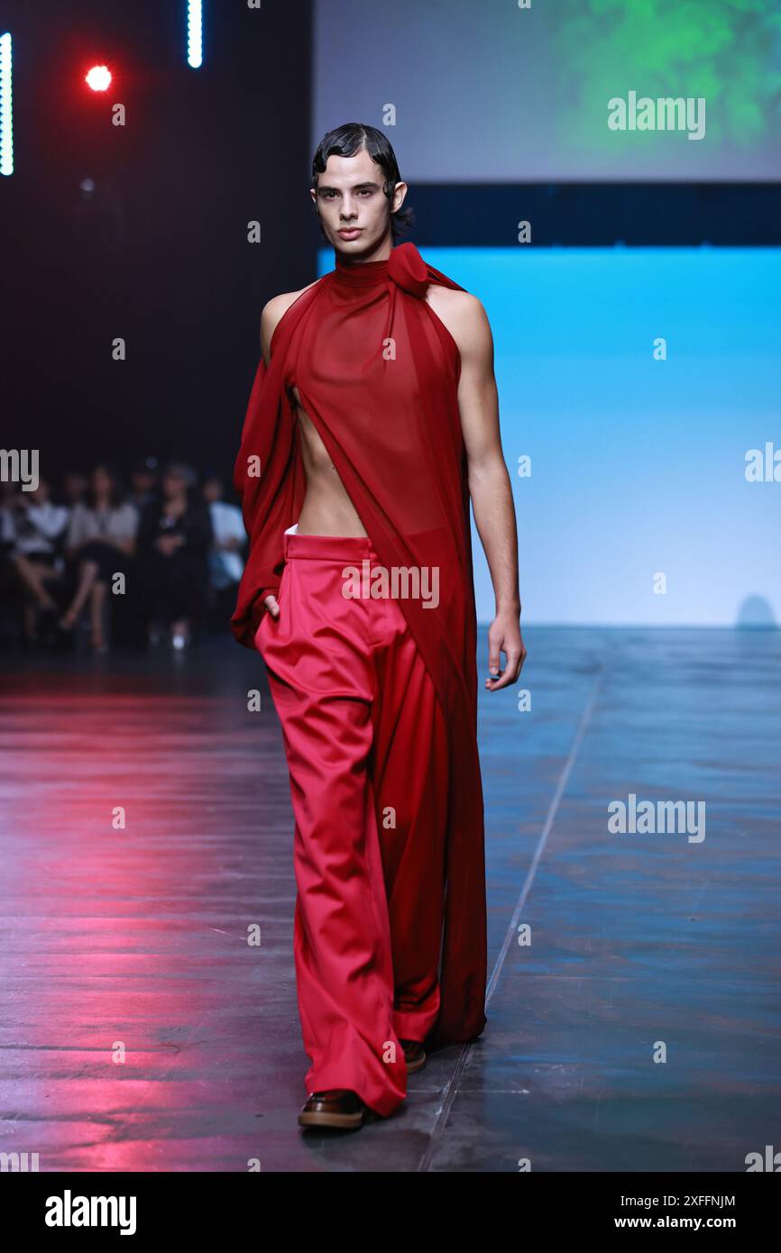 BERLIN, GERMANY - July 3th: A model walks the runway during the Danny ...