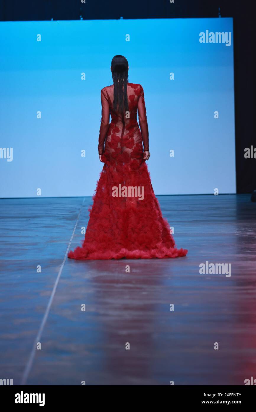 BERLIN, GERMANY - July 3th: A model walks the runway during the Danny ...