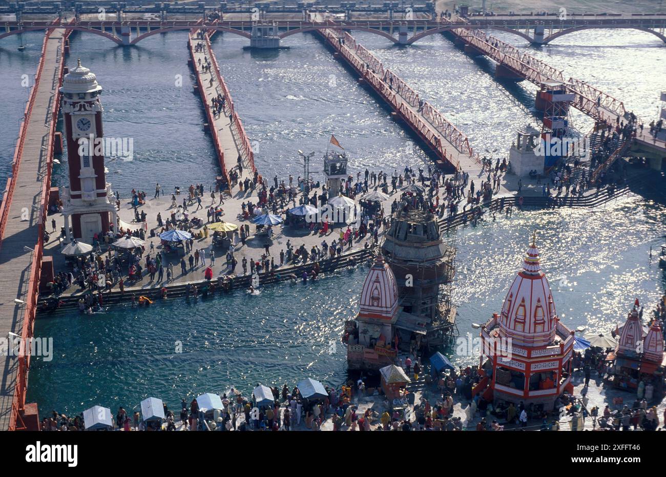 a view over public aerea with the Clock Tower at the Holy Ganges River ...
