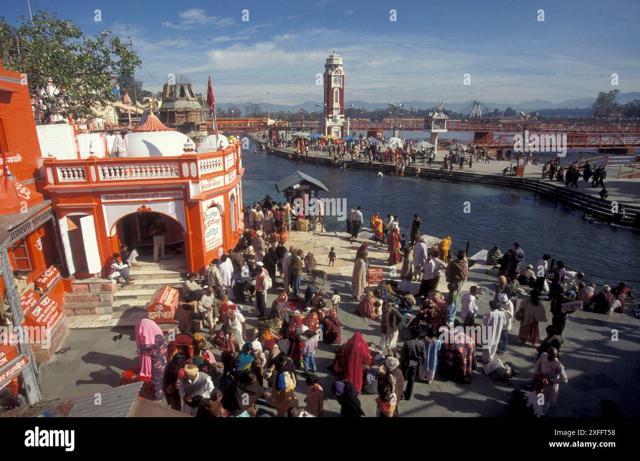 a view over public aerea with the Clock Tower at the Holy Ganges River ...