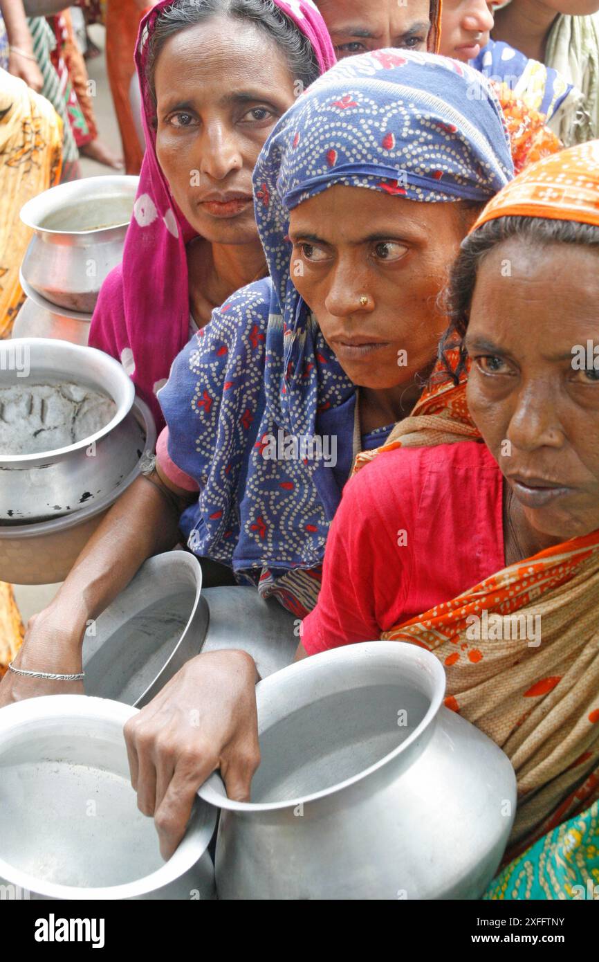 Flood affected woman looking for relief at a flood shelter center at ...