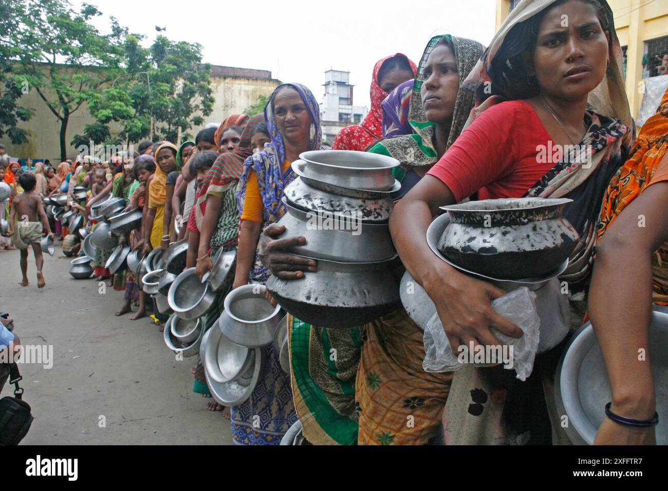 Flood affected woman looking for relief at a flood shelter center at ...