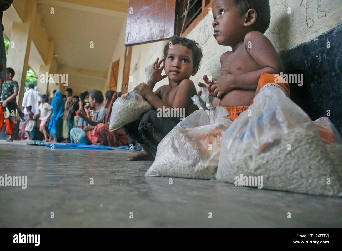 Asian children shelter from hi-res stock photography and images - Alamy