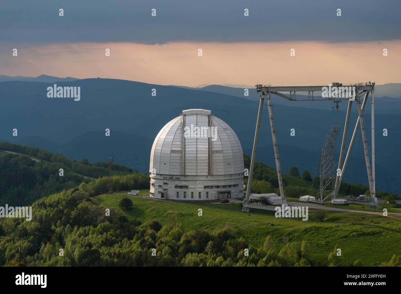 Large observatory dome with a metal crane structure. BTA 6. Large ...