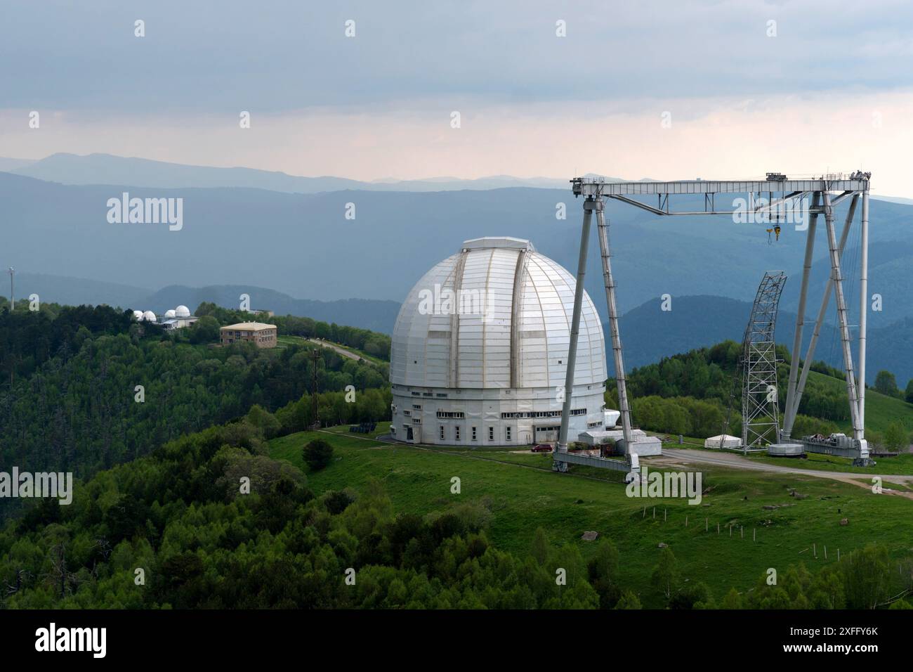 Large observatory dome with a metal crane structure. BTA 6. Large ...