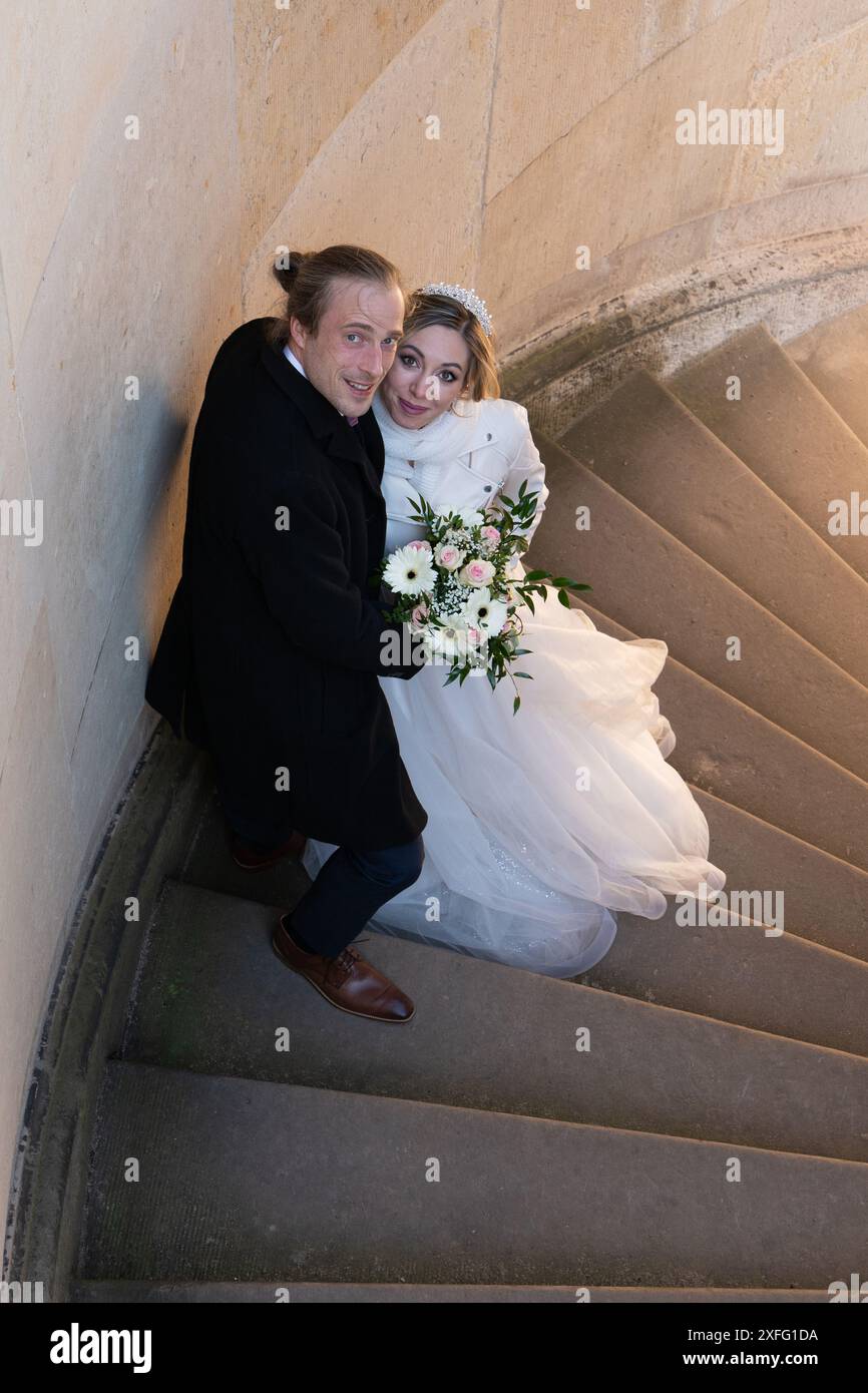 bride and groom are walking around the city. Wedding photo of bride and ...