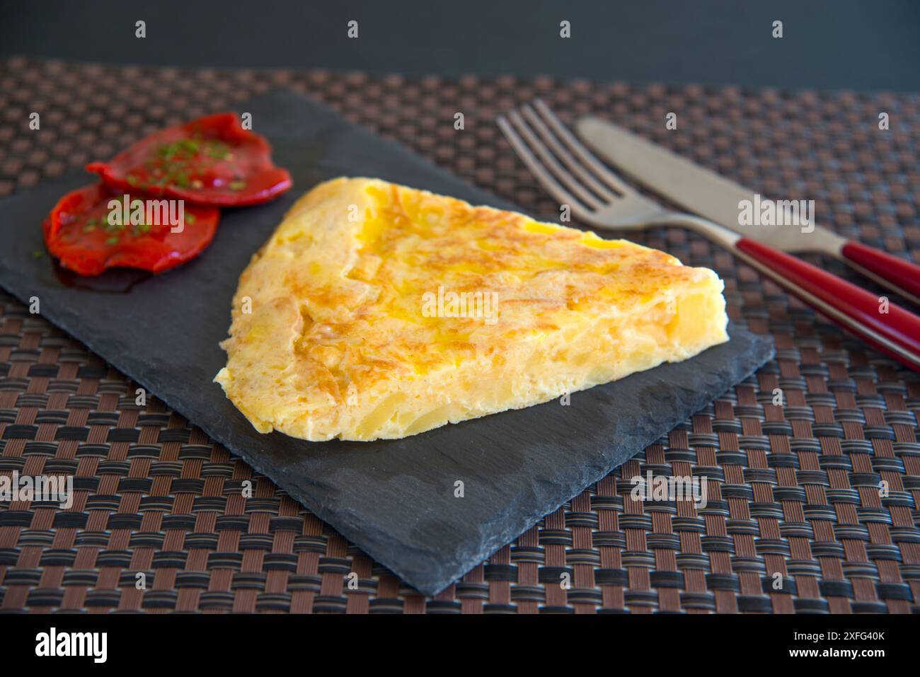 Spanish omelet serving Stock Photo - Alamy