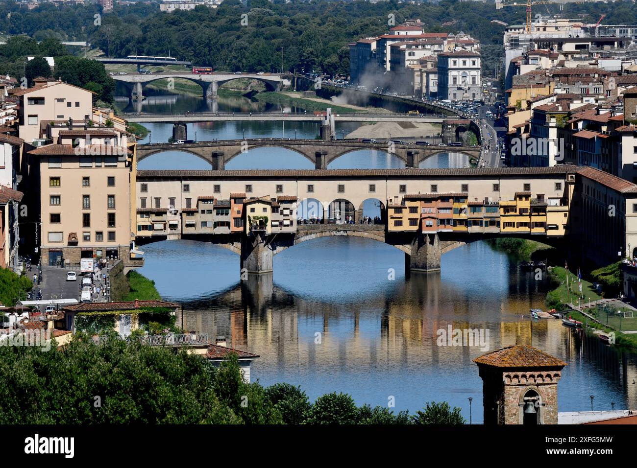 The Ponte Vecchio medieval stone arch bridge over the RiverArno, in ...