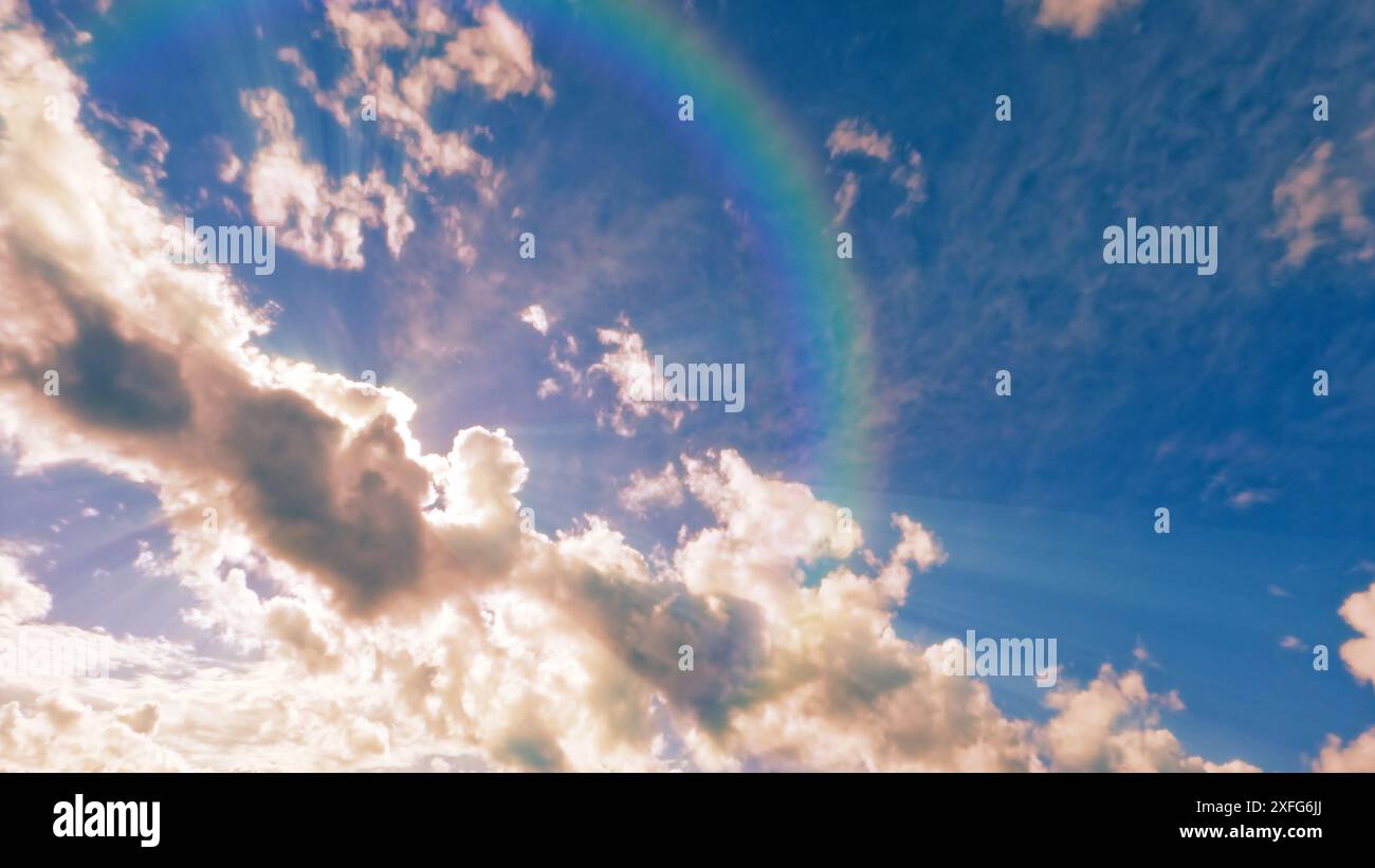 nice rainbow after the shower rain on clouds in the sky - photo of ...